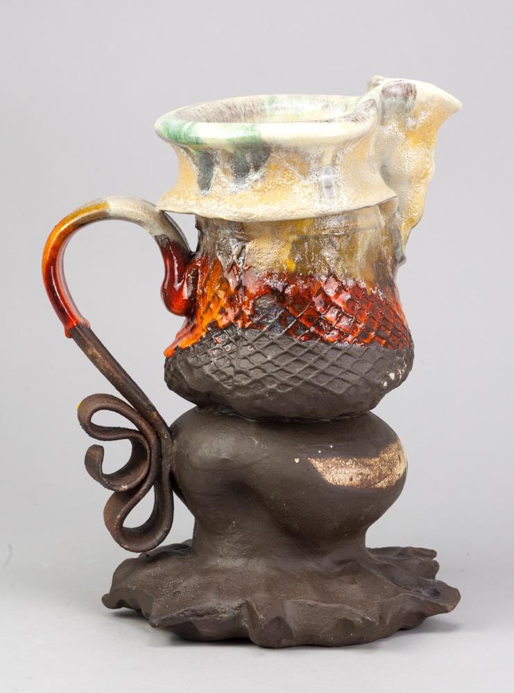 Simon Carroll | a tall earthenware jug covered in coloured slips and ...