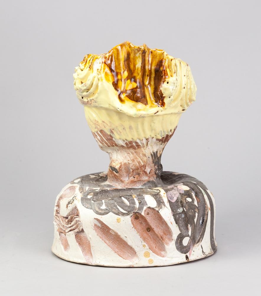 Simon Carroll | an earthenware jug with large foot covered in coloured ...