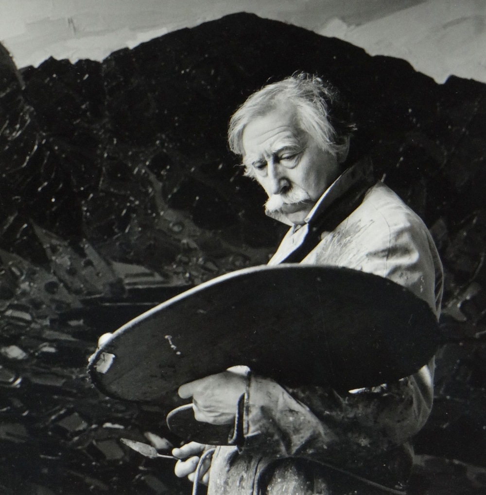 Nicholas Sinclair | Sir Kyffin Williams RA at work in overcoat with ...
