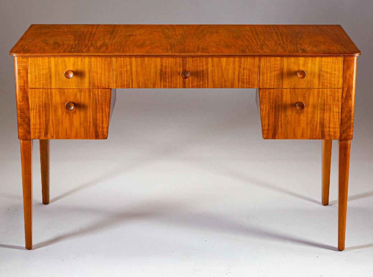 Gordon Russell | a walnut dressing table | MutualArt