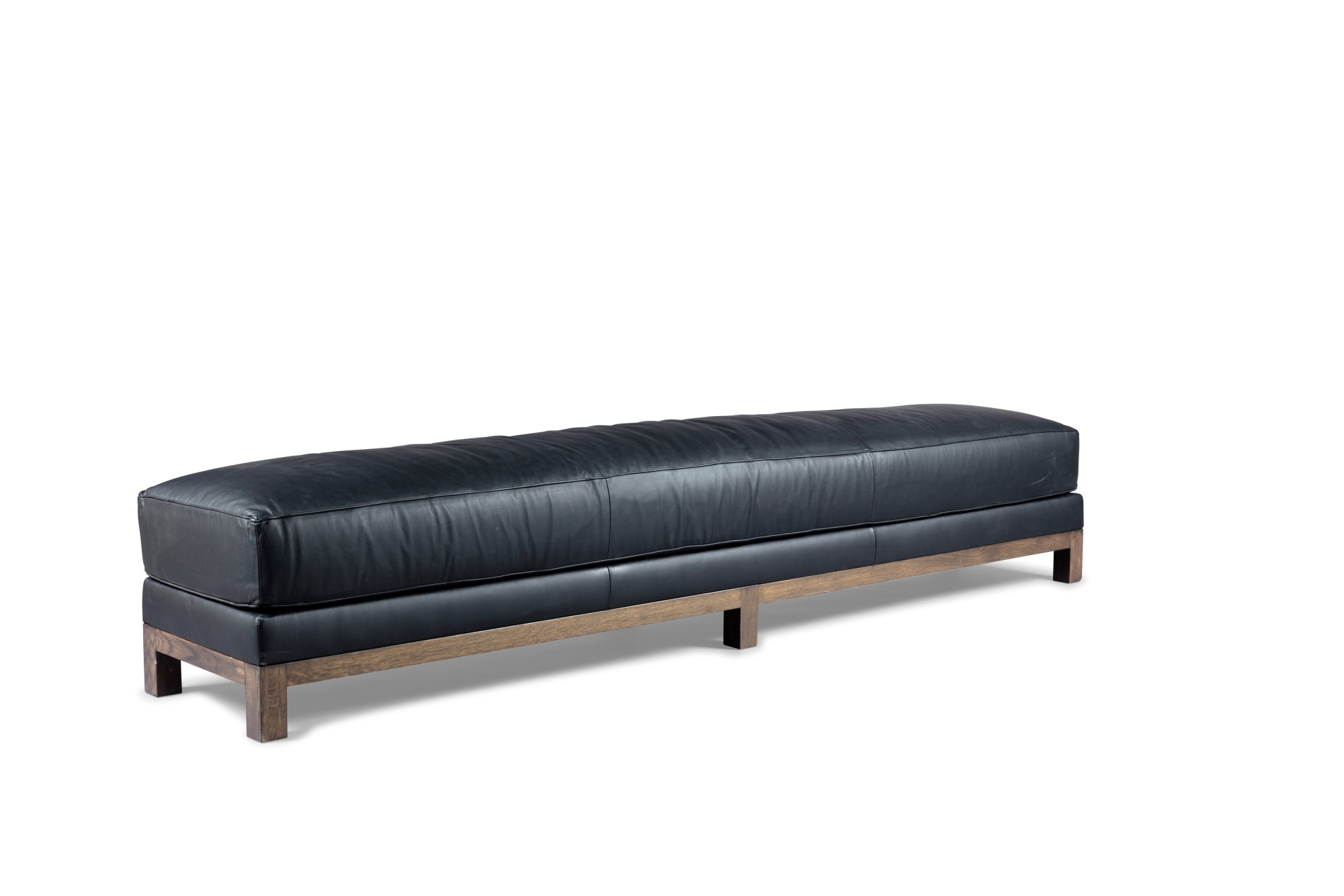 Christian Liaigre | A black leather bench seat | MutualArt