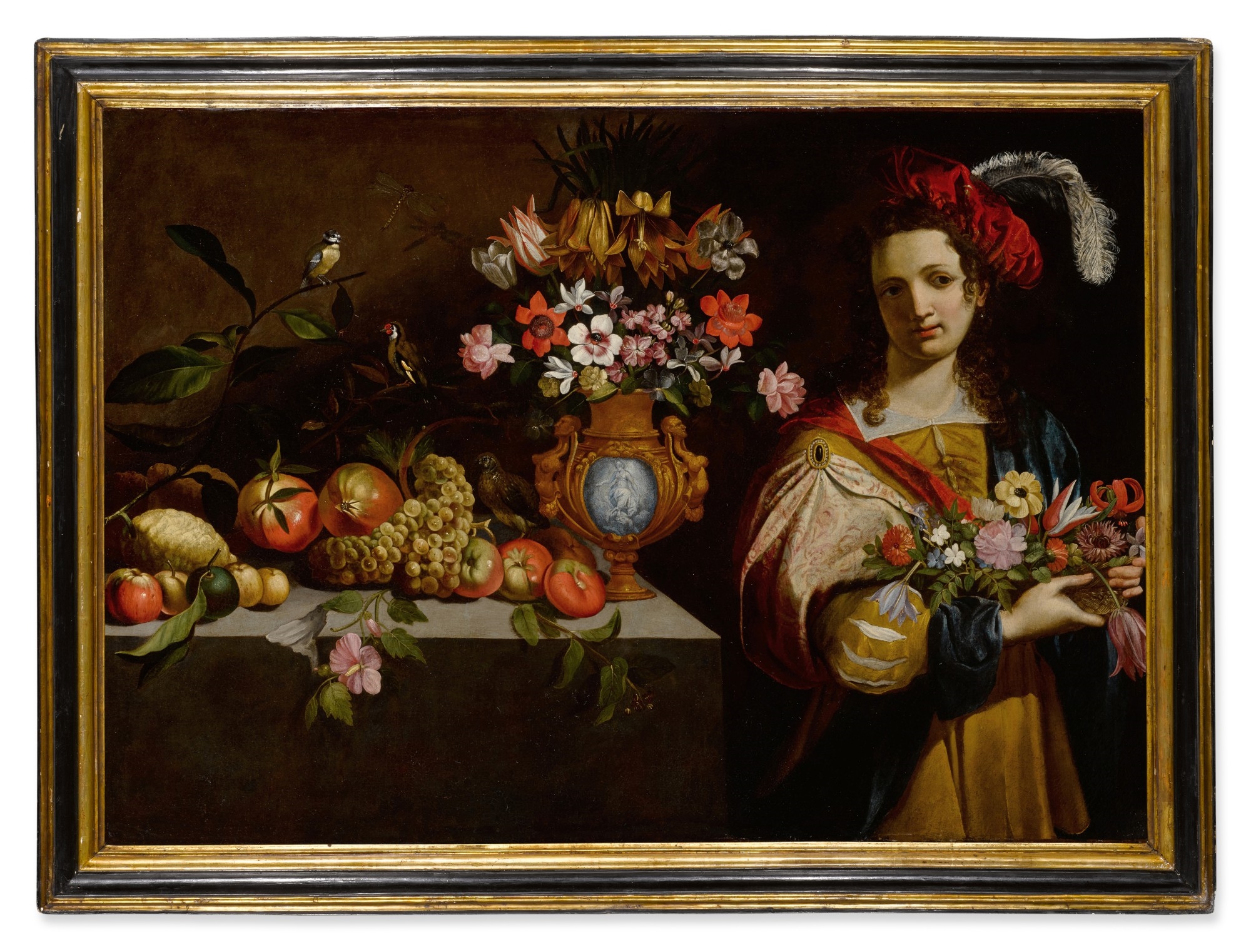Giovanni Stanchi | Still life with fruits, a vase, birds and a youth ...