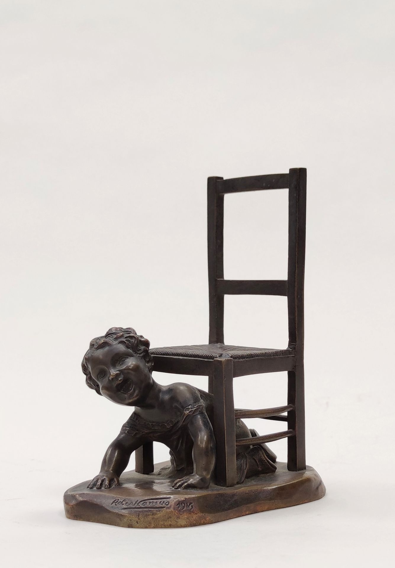 Robert Camus | Laughing child, playing under a chair (1916) | MutualArt