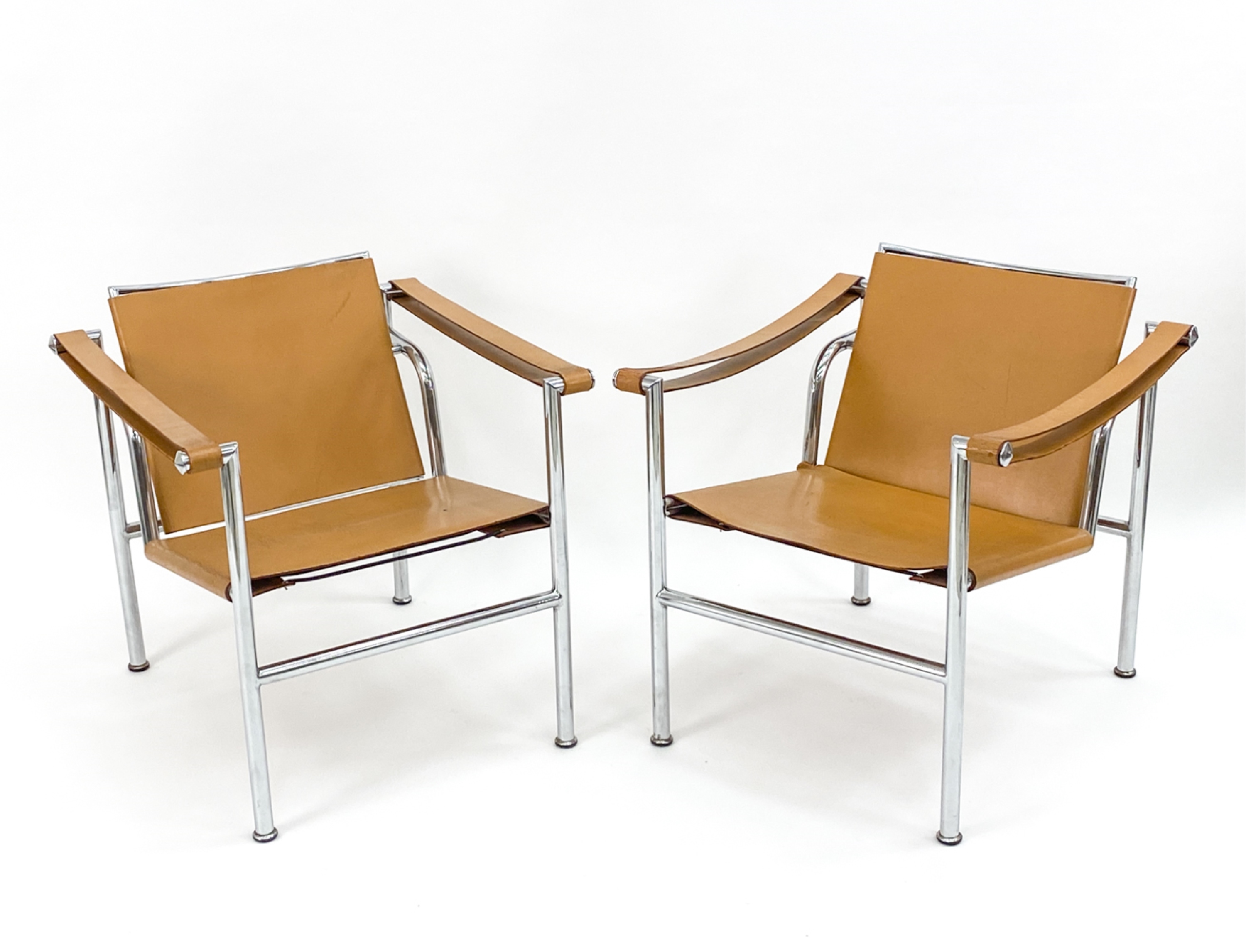 Le Corbusier | PAIR OF LE CORBUSIER LC1 BASCULANT ARM CHAIRS (1928 ...