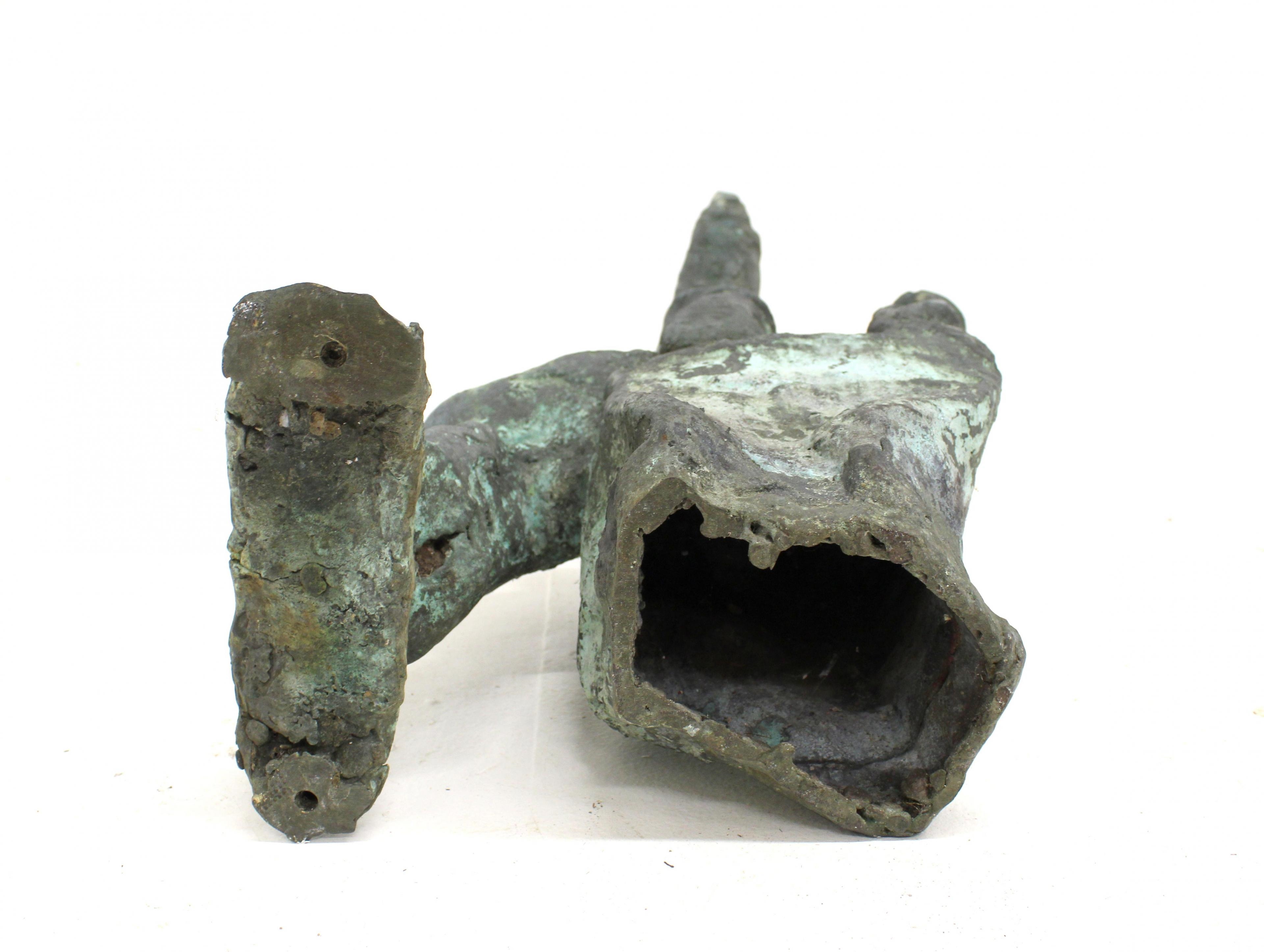 Jacob Jutte | De bronzen beeldengroep van een getroond figuur met ...