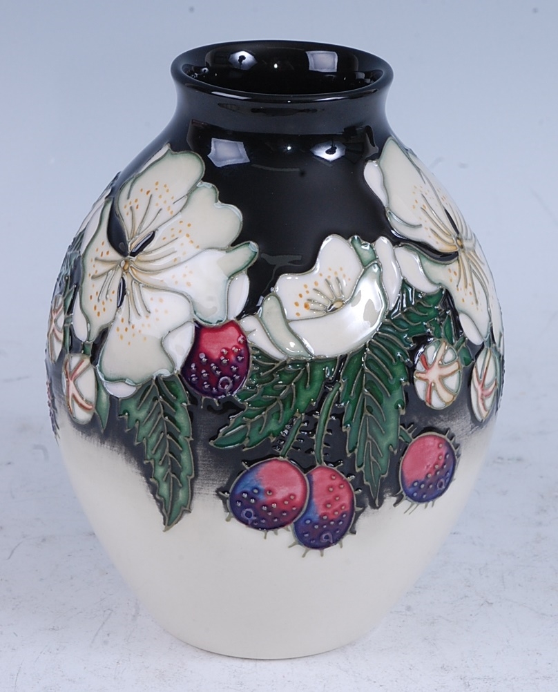 Nicola Slaney | A contemporary Moorcroft pottery vase in the Christmas ...