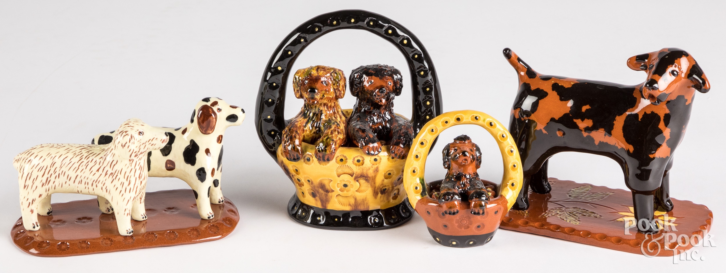 Lester Breininger | Four Lester Breininger redware dog figures | MutualArt
