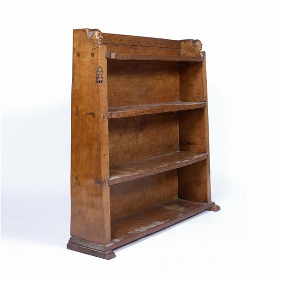 Whittaker | Oak bookcase, with two carved monk`s head terminals, with ...