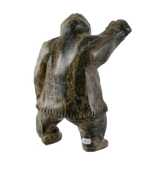 Enook Manomie | Serpentine Sculpture of an Inuit with Raised Arm ...