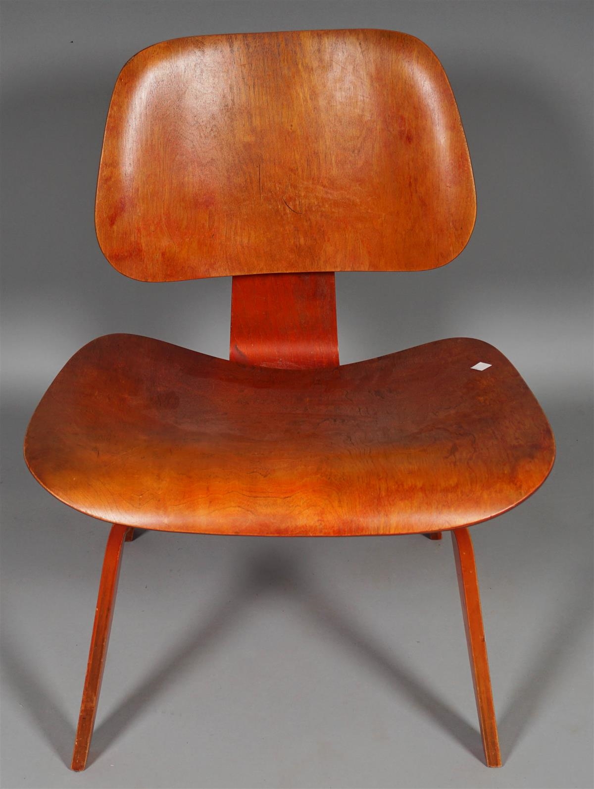 Charles Eames | CHARLES EAMES RED STAINED BIRCH DCW SIDE CHAIR | MutualArt
