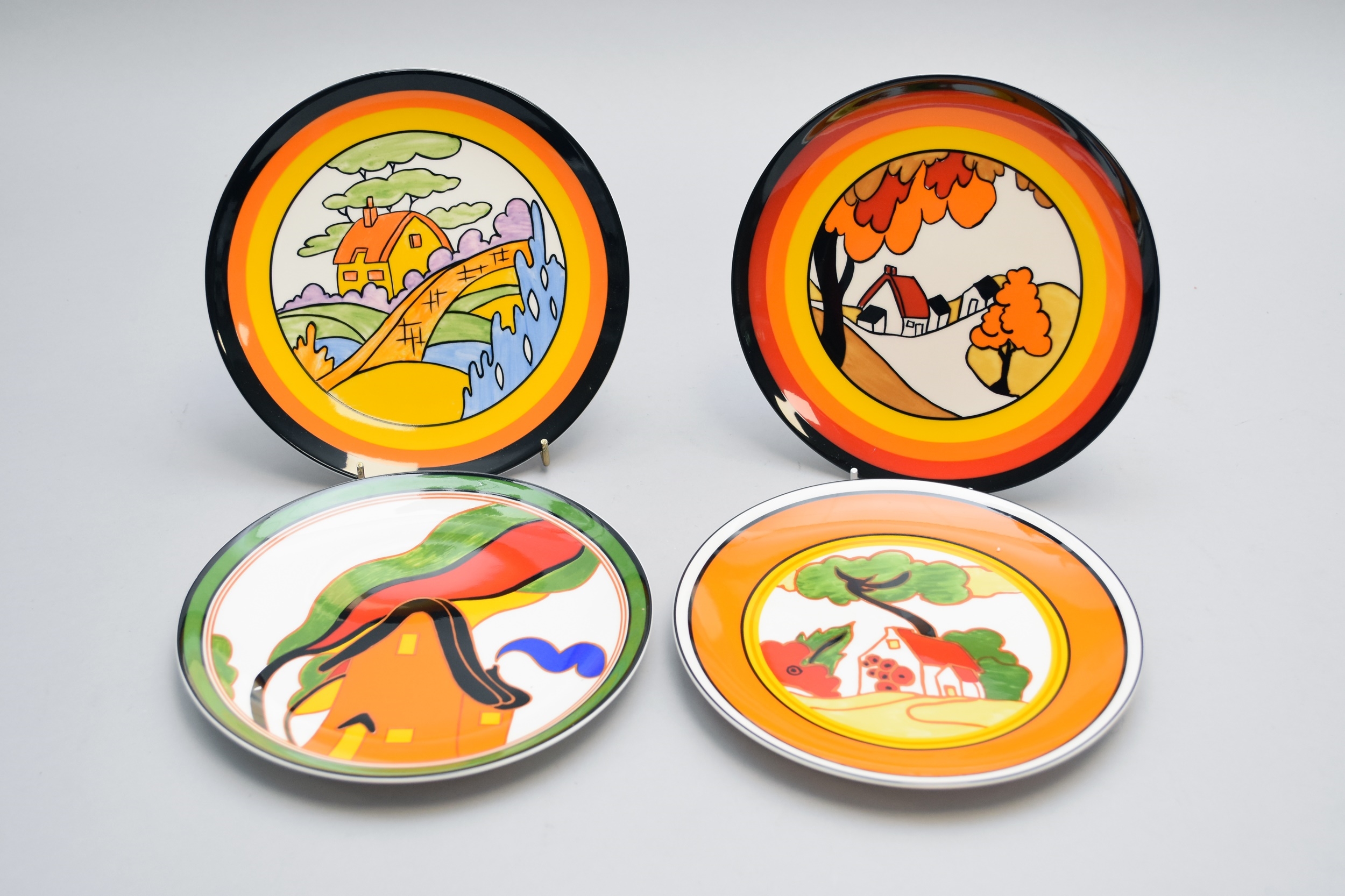 Clarice Cliff | A group of Wedgwood Clarice Cliff plates and enamel ...