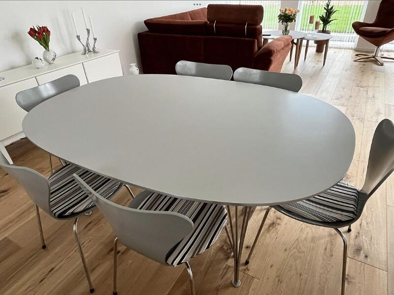 Piet Hein | Superellipse dinning table with top of grey laminate and a ...