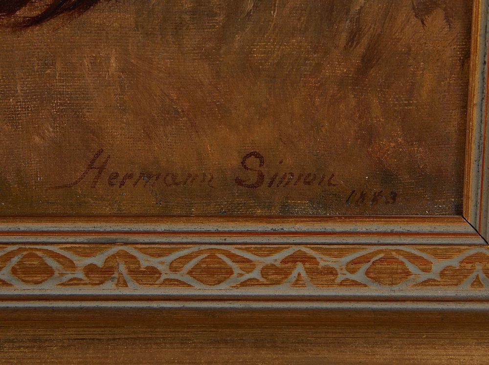 Hermann Simon | An Irish Setter curled on the grass, gazing up at the ...