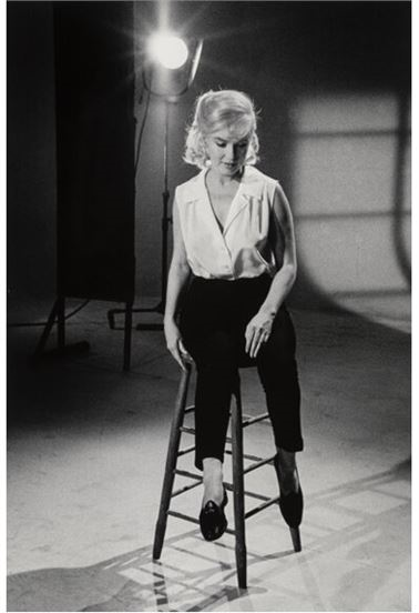 Bruce Davidson | Marilyn Monroe Seated on a Bar Stool on Stage with One Spotlight Behind Her ...