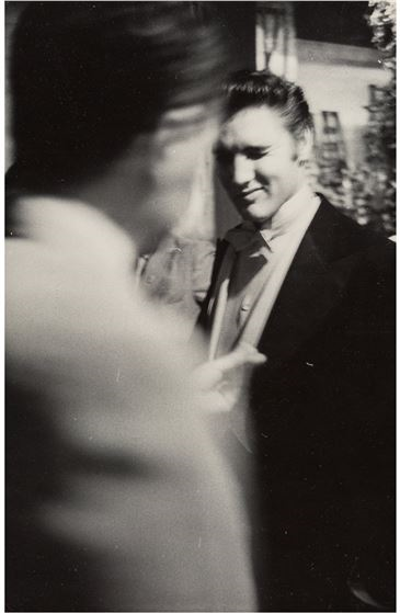 Alfred Wertheimer | Elvis Presley Winking to a Fan (1956) | MutualArt