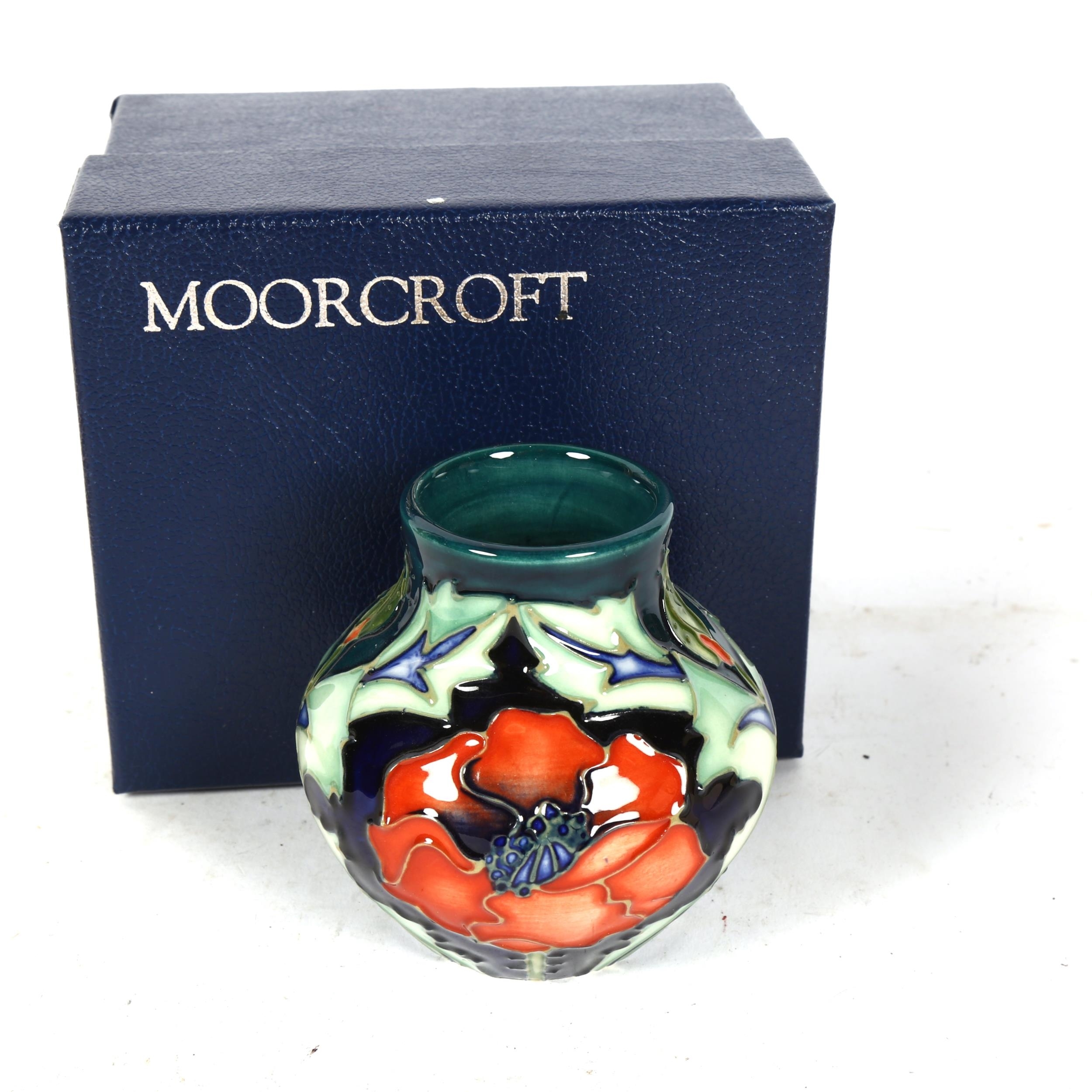 William Moorcroft | A Moorcroft Poppy pattern squat vase | MutualArt