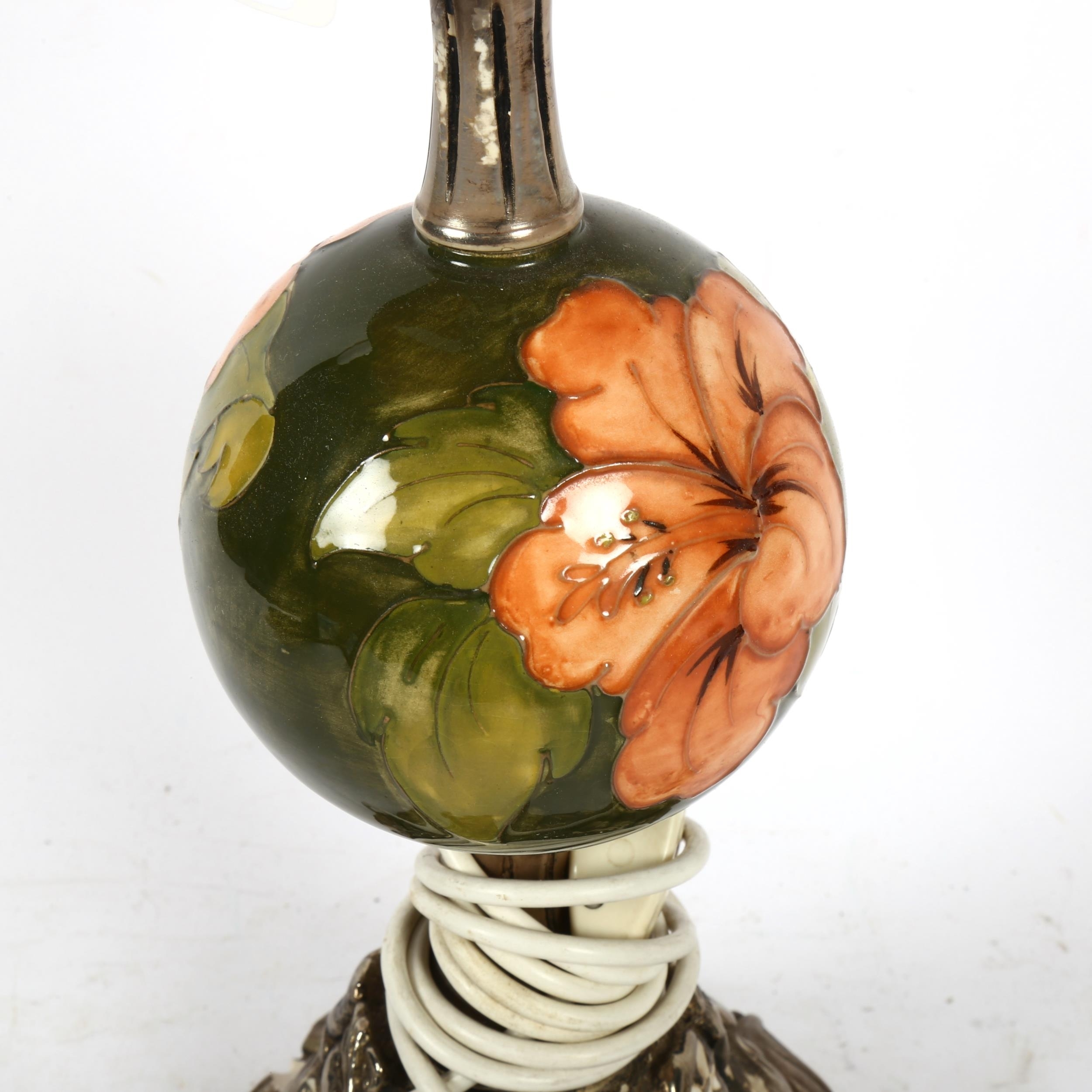 William Moorcroft | A Moorcroft table lamp and shade | MutualArt