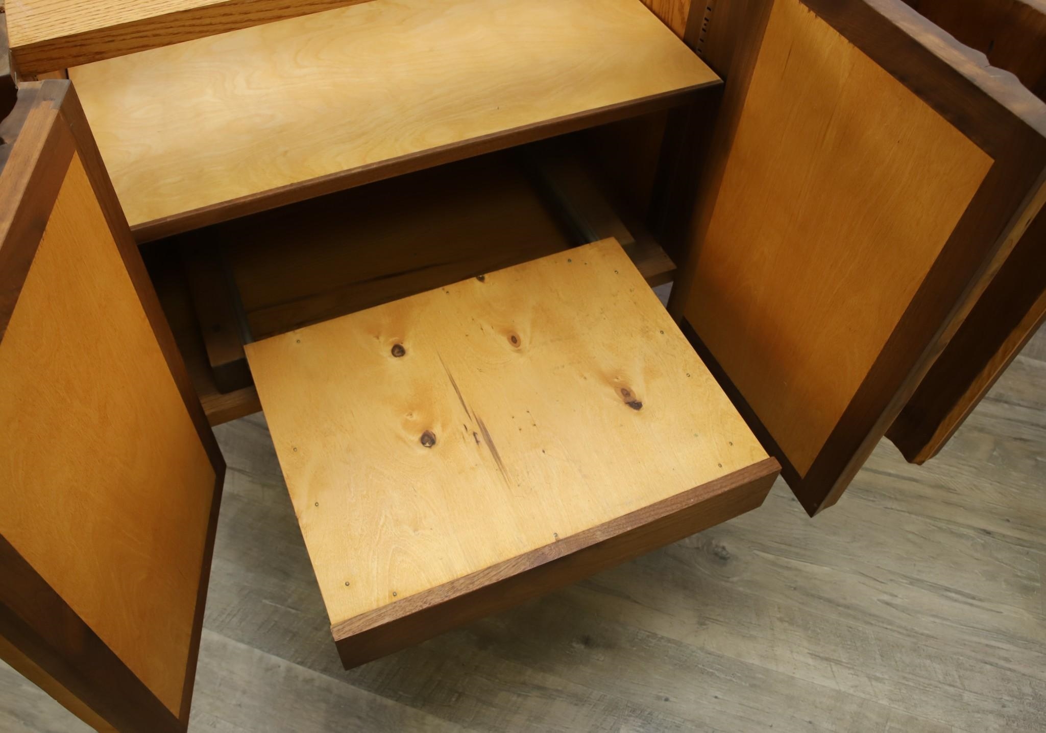 Gino Russo | four chip-carved chiseled doors opening to shelving and a ...