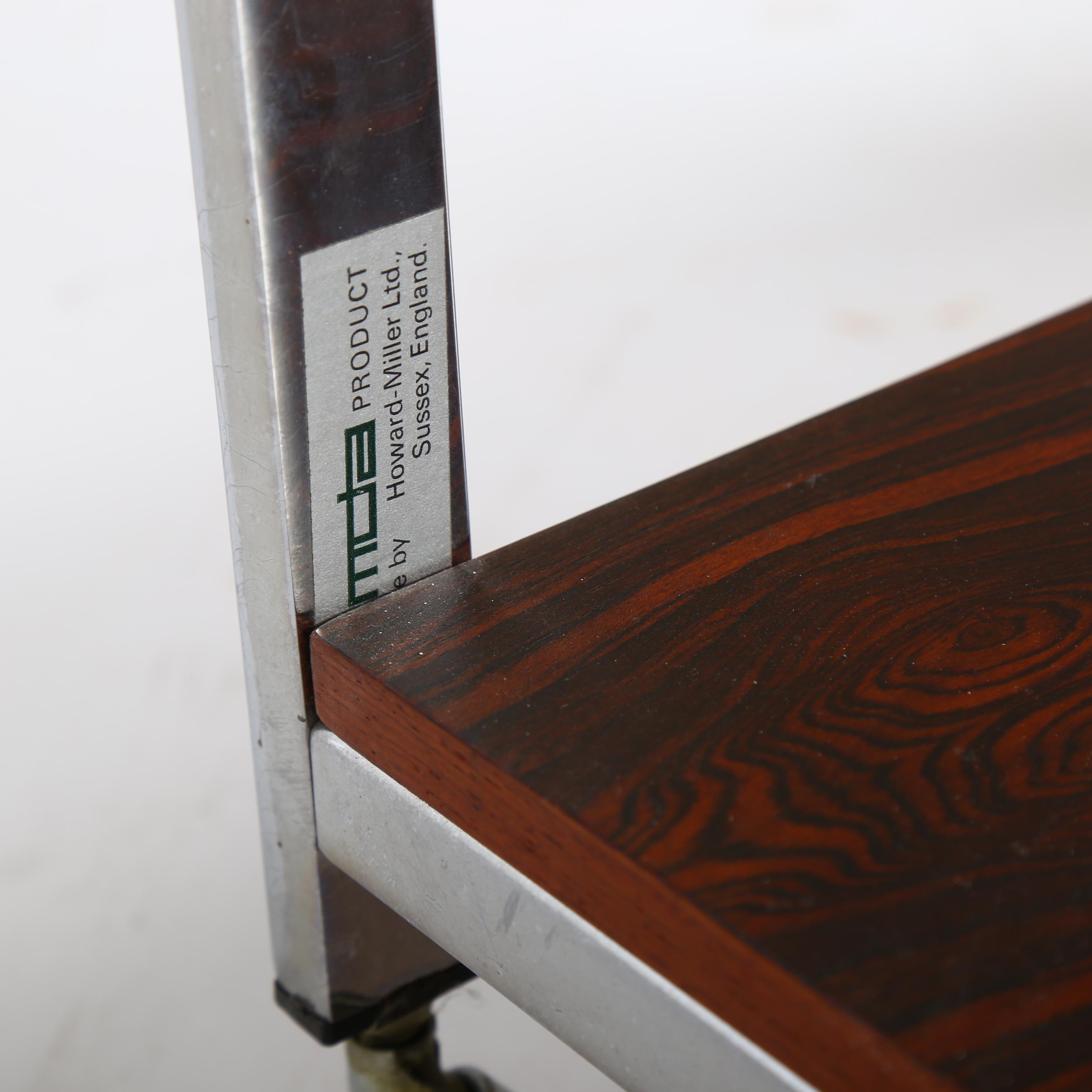 Howard Miller | Side table on casters | MutualArt