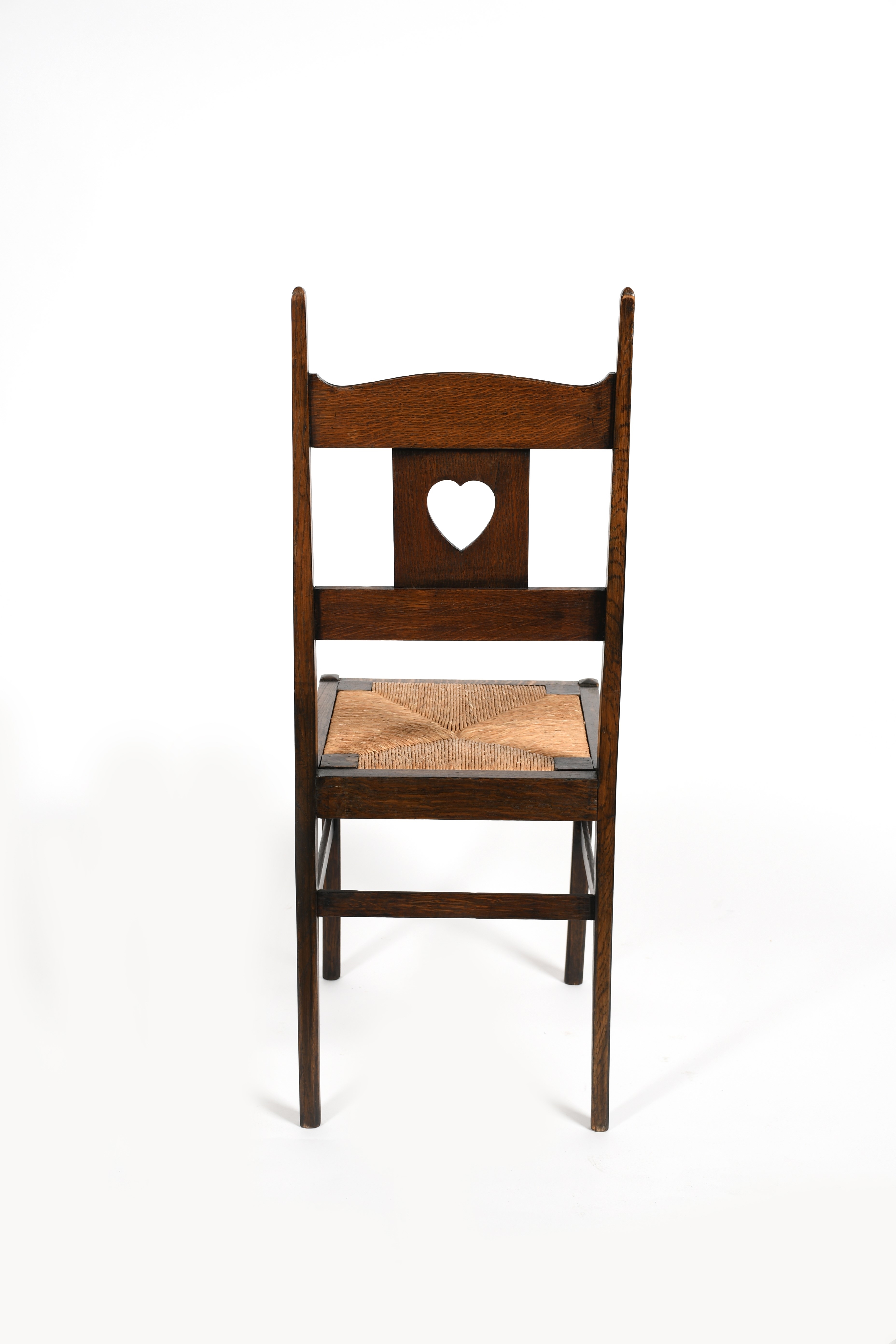 Charles Francis Annesley Voysey | A rare oak side chair designed by ...