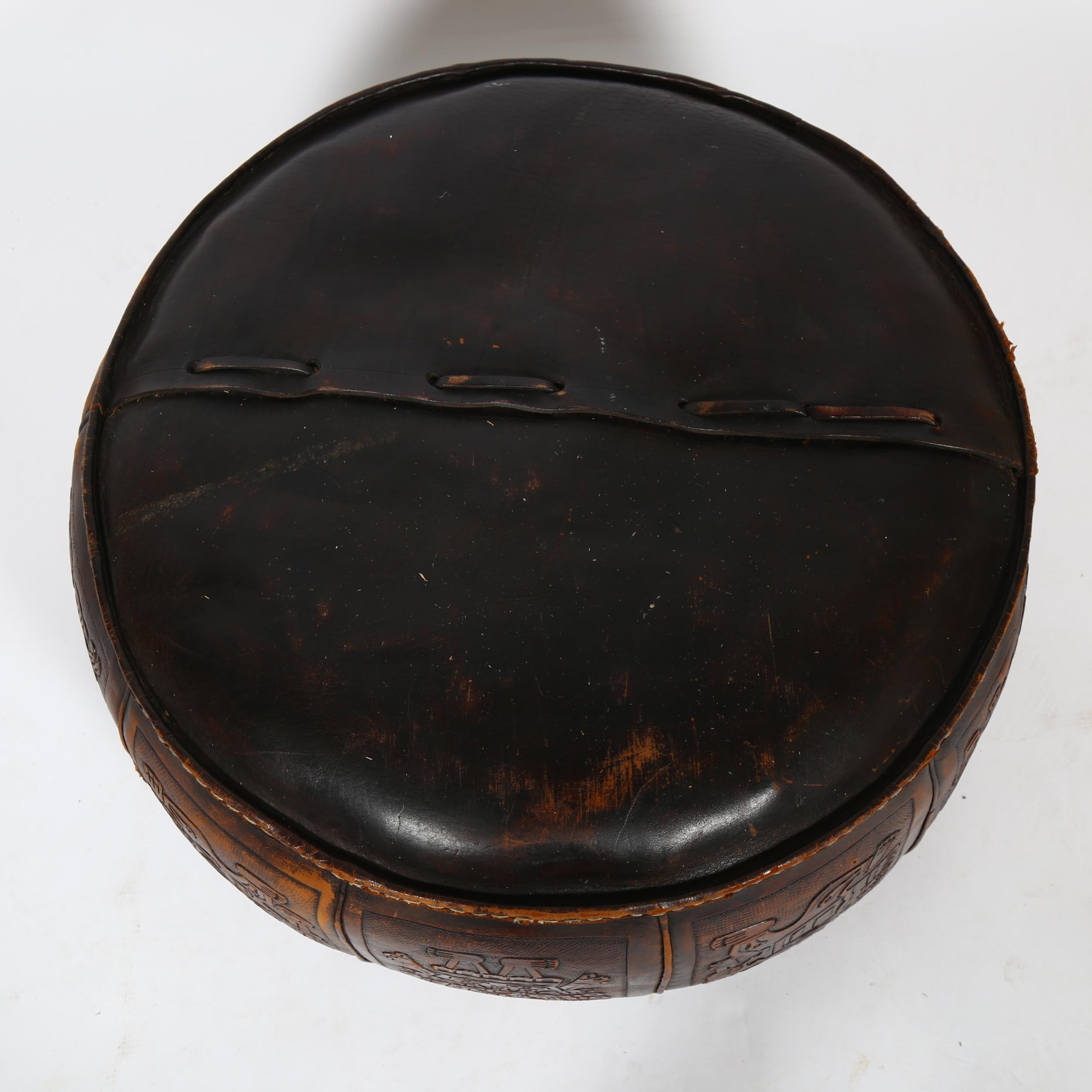 Angel Pazmino | A mid-century Aztec design leather ottoman or pouffe ...