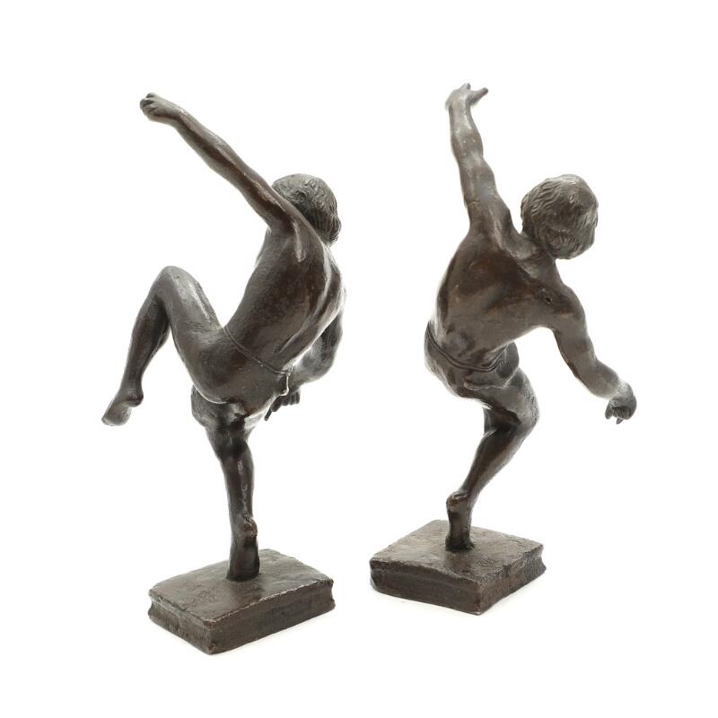 Stephan Abel Sinding | A pair of patinated bronze stauettes in shaped ...
