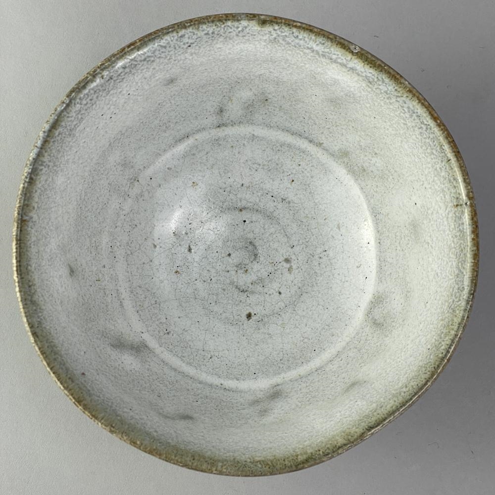 Jim Malone | a stoneware chawan covered in white glaze with impressed ...