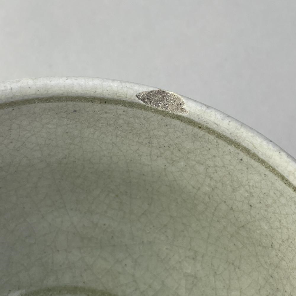 Ursula Mommens | a stoneware bowl covered in celadon glaze with incised ...