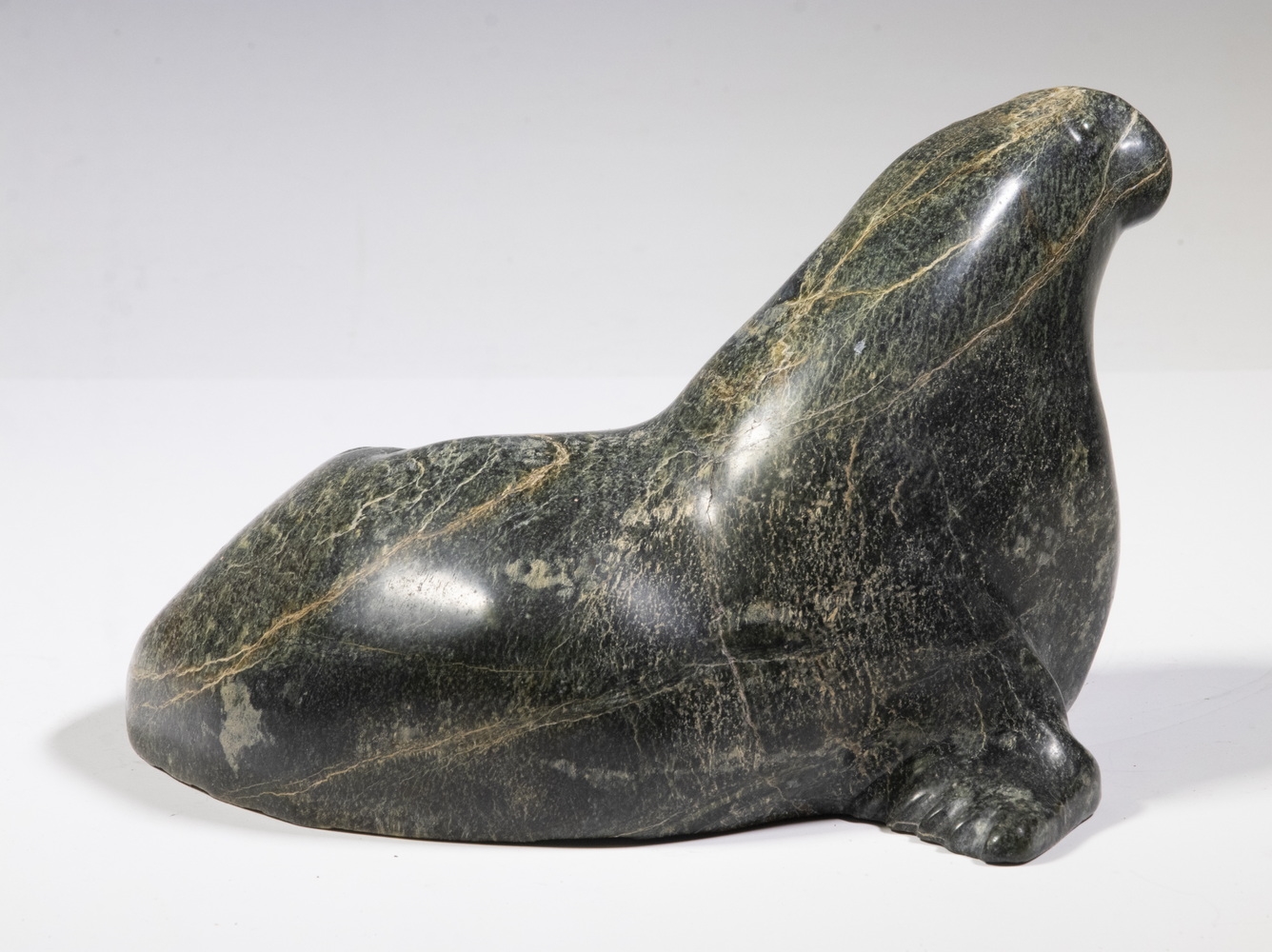 Enook Manomie | Sculpture of a Resting Walrus | MutualArt
