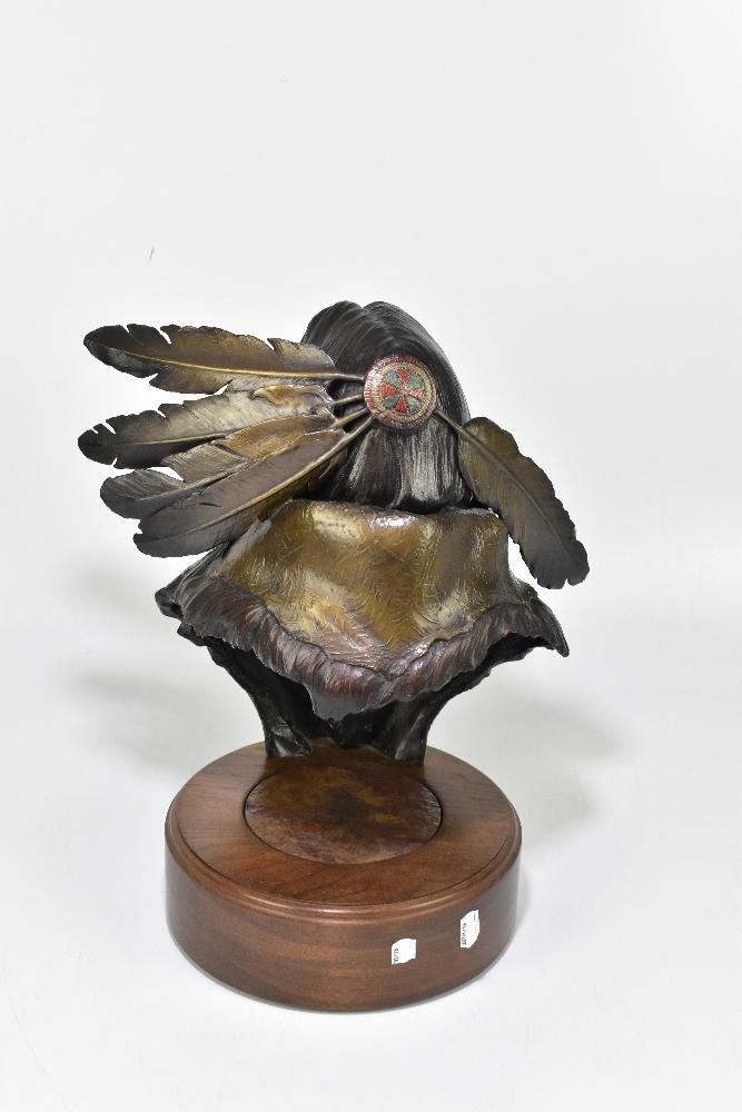 Dan Garrett | Sculpture of a Native American on a circular | MutualArt