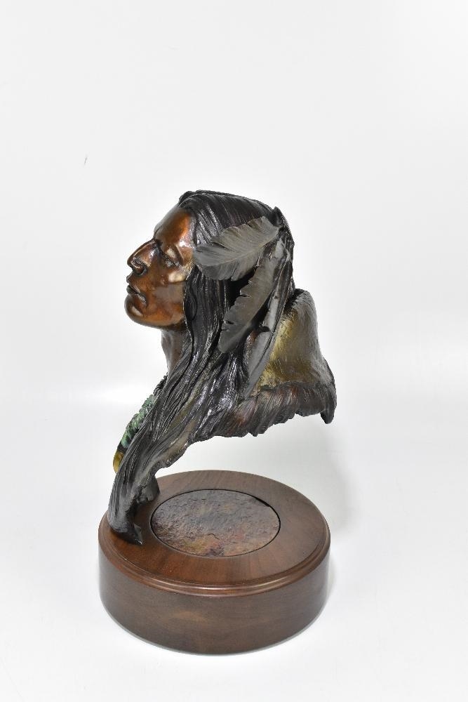 Dan Garrett | Sculpture of a Native American on a circular | MutualArt