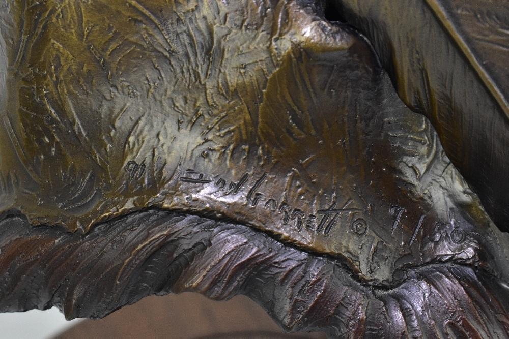 Dan Garrett | Sculpture of a Native American on a circular | MutualArt