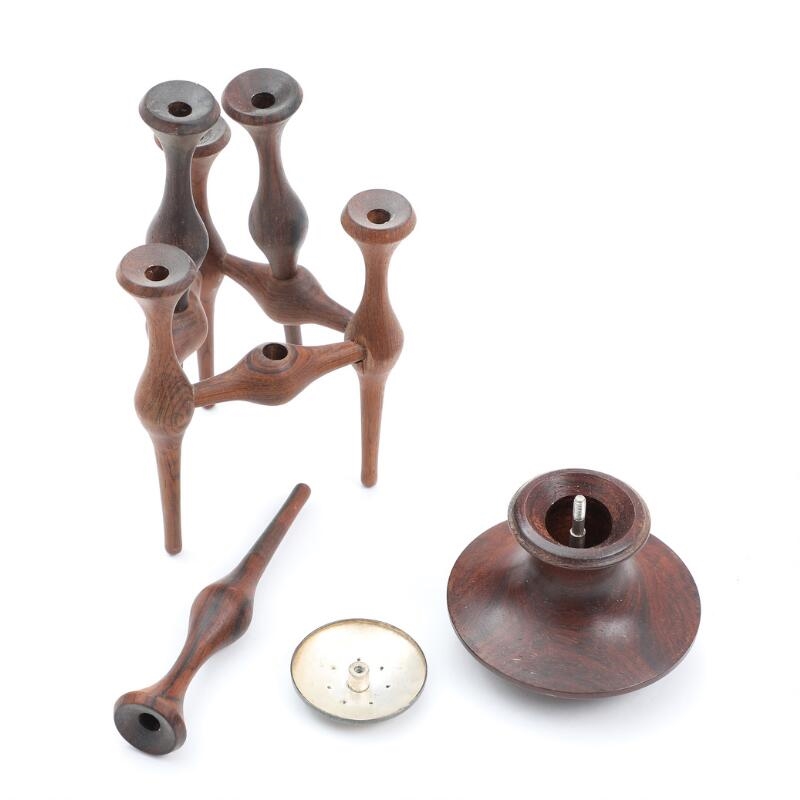 Jens Quistgaard | A rosewood candlestick and salt sprinkler | MutualArt