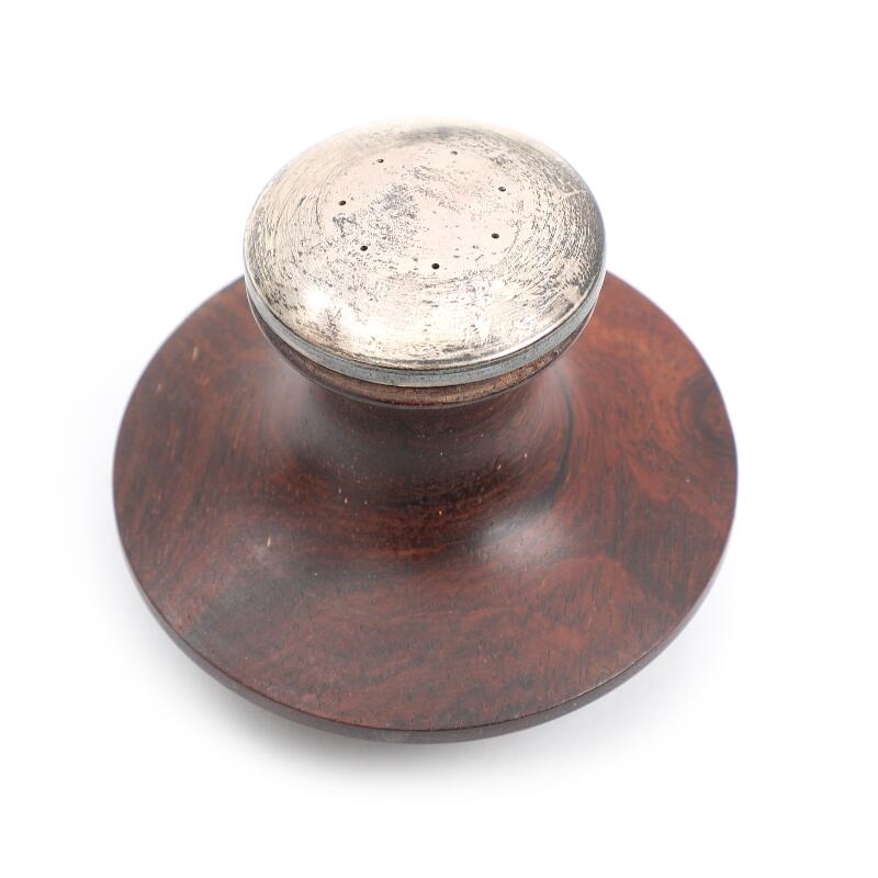 Jens Quistgaard | A rosewood candlestick and salt sprinkler | MutualArt