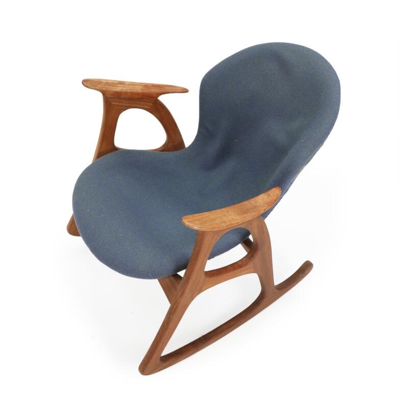 Aage Christiansen | A teak rocking chair upholstered with blue wool ...