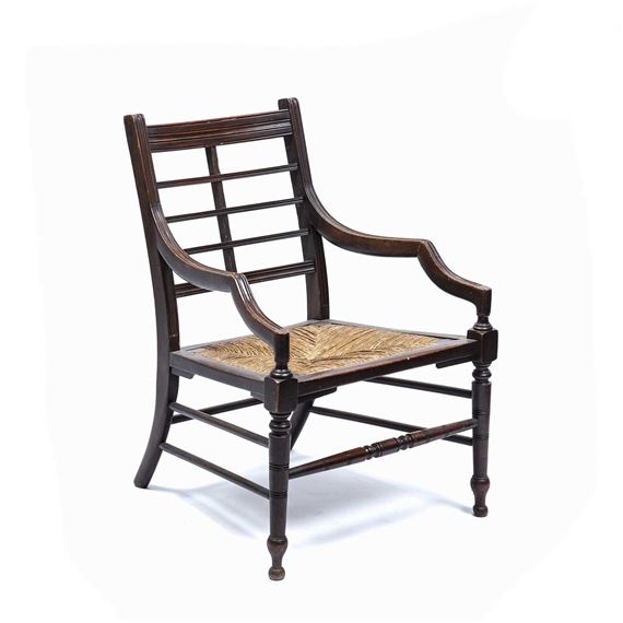 Edward William Godwin | Elbow chair with raffia seat | MutualArt