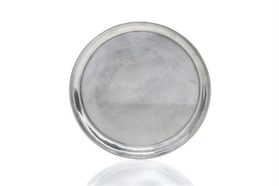 Georg Jensen | A circular tray with raised rim. (20) | MutualArt