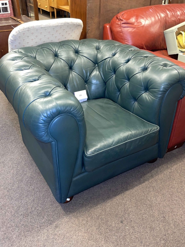 Chesterfield | Green buttoned leather Chesterfield chair. | MutualArt