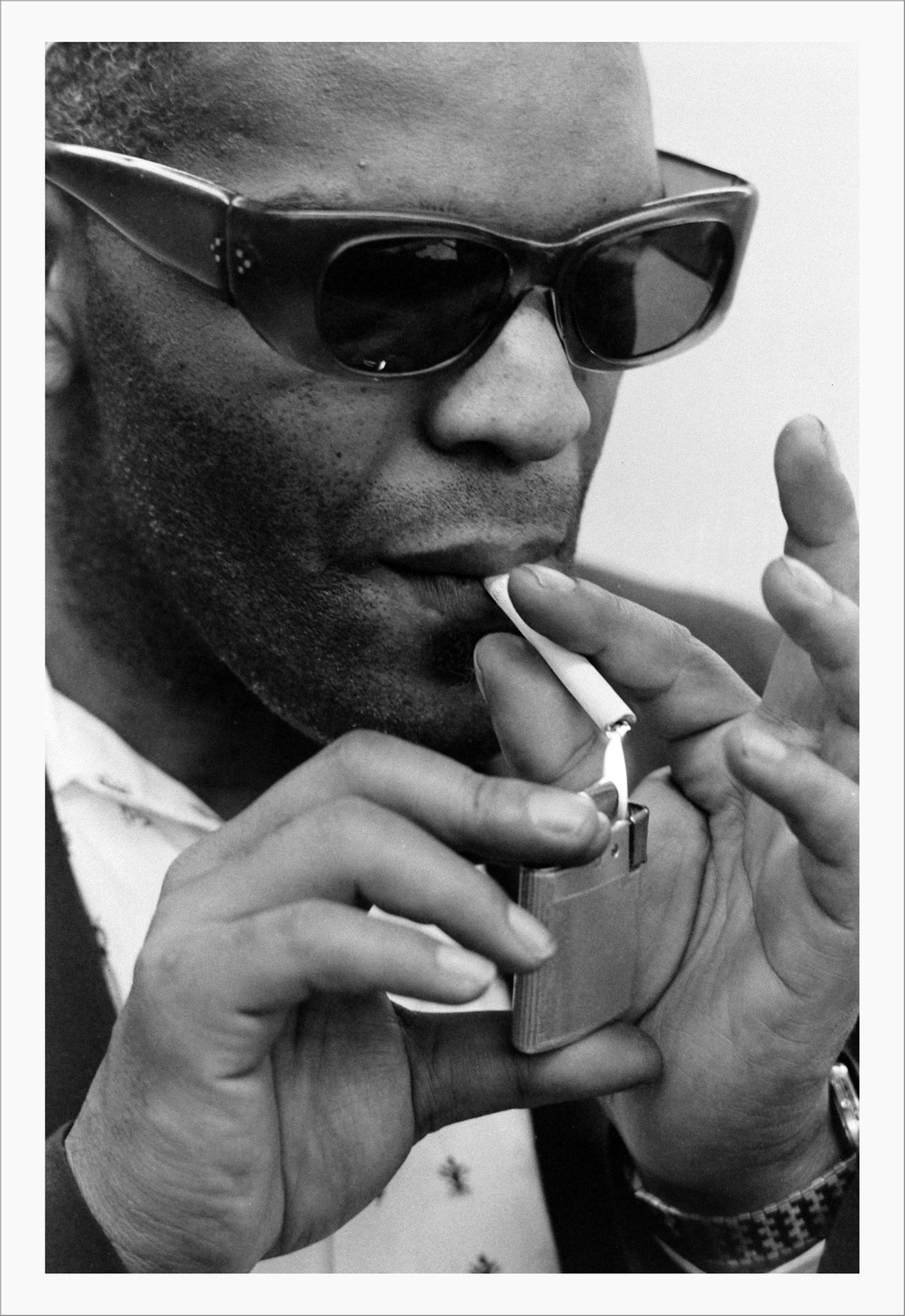 Bill Ray | Close-up of singer Ray Charles lighting a cigarette (1966 ...