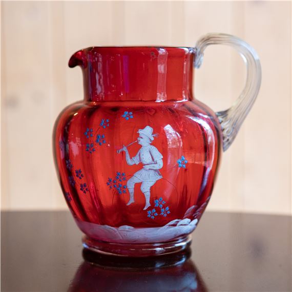 Mary Gregory | pitcher depicting a boy playing an instrument | MutualArt