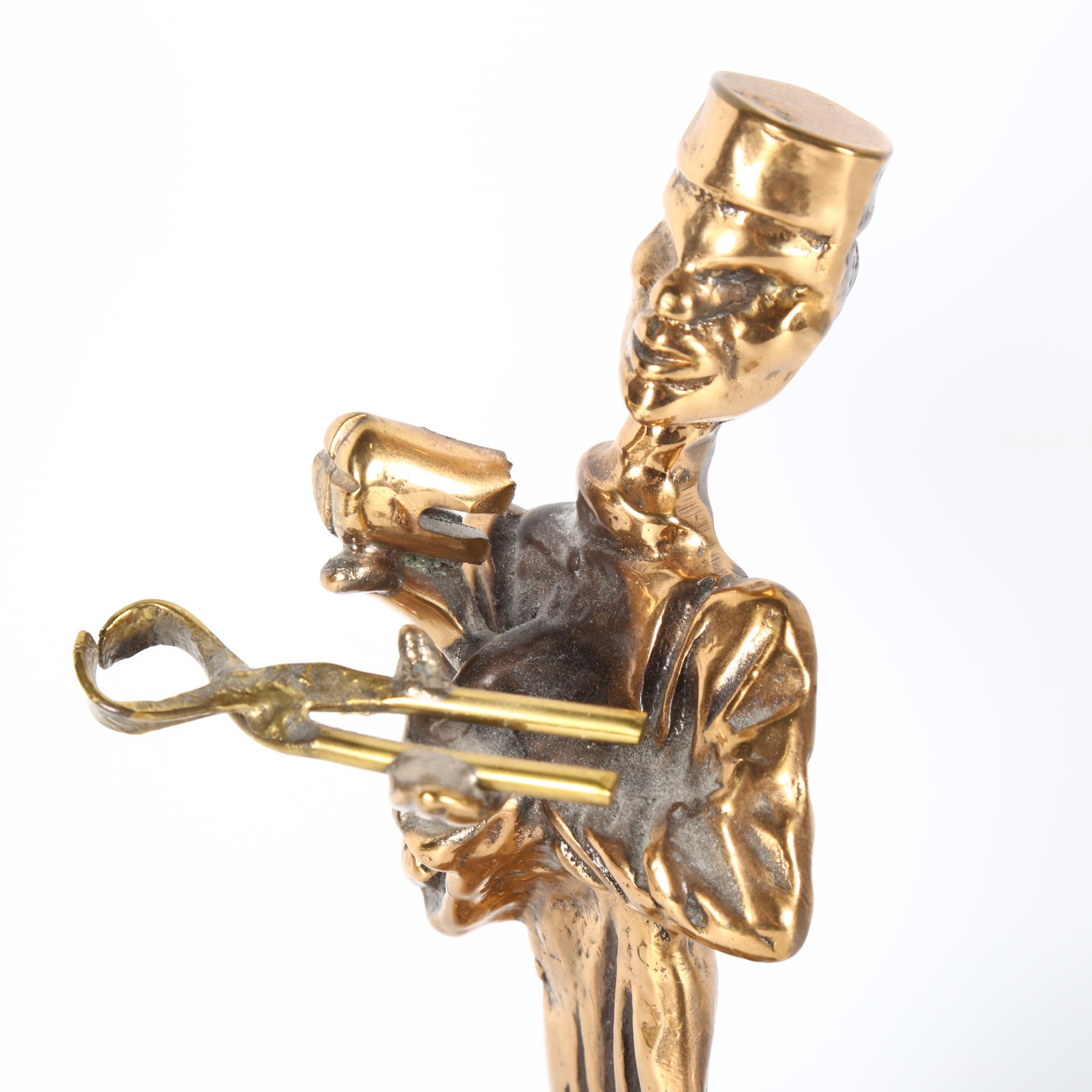 Yves Lohé | a gilded bronze sculpture of a blacksmith | MutualArt