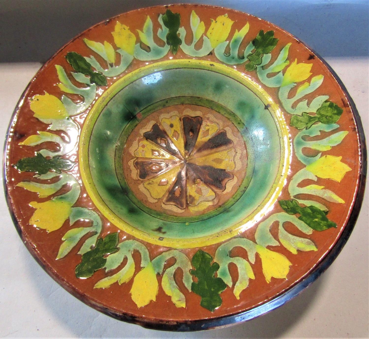 Della Robbia Pottery | A Della Robia dished plate with repeating ...