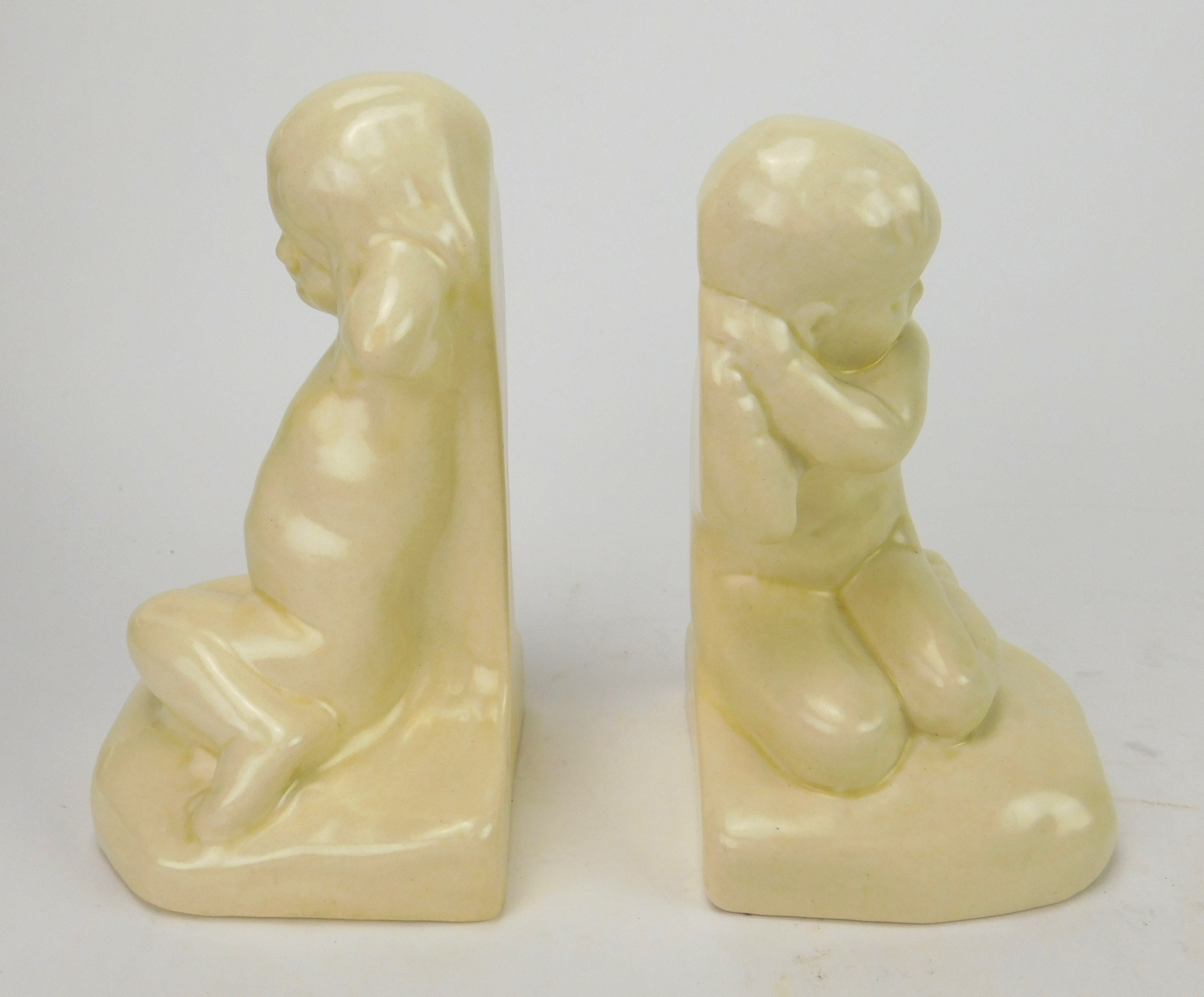 Cole Pottery | Boy & Girl'' bookends | MutualArt