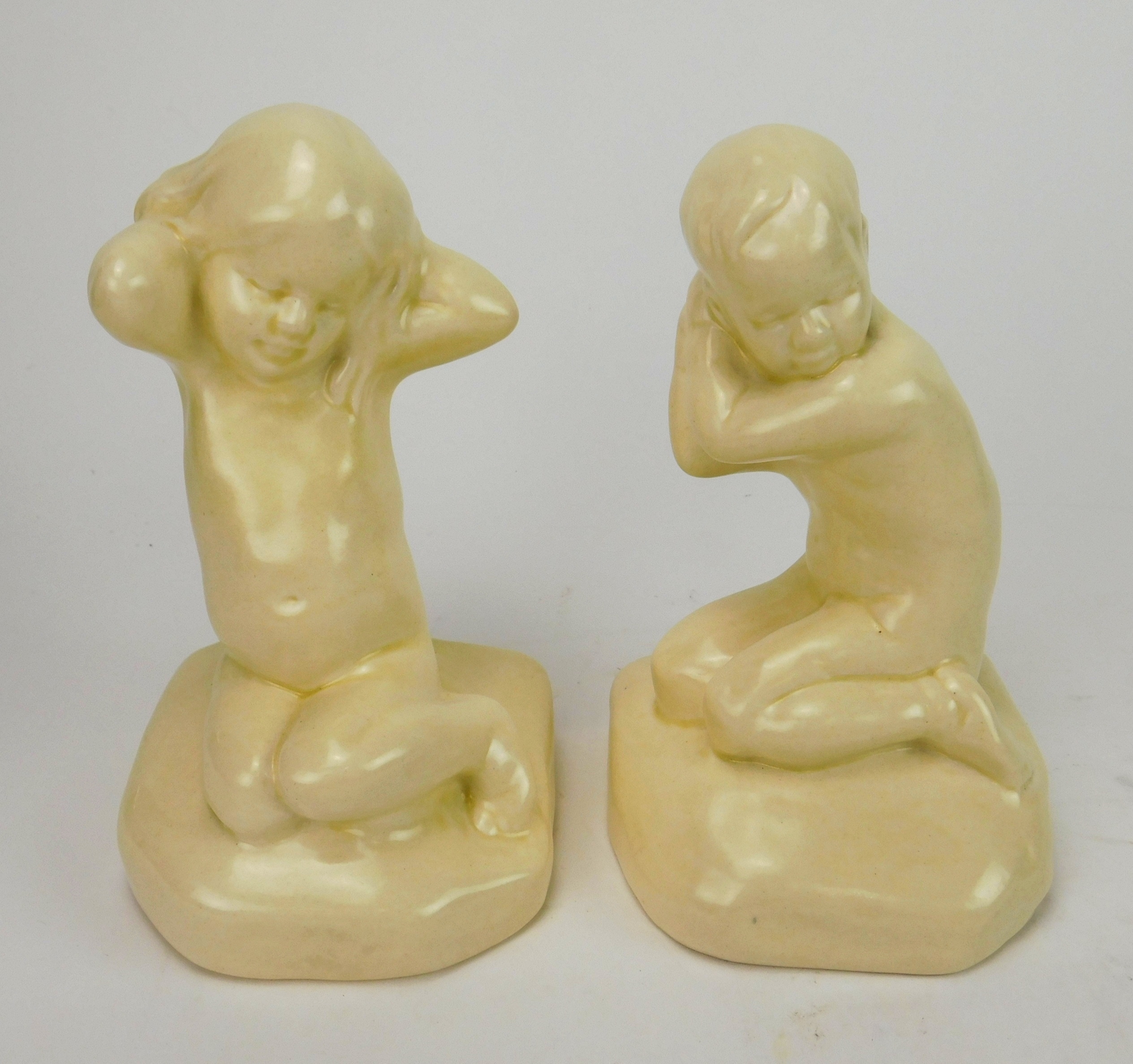 Cole Pottery | Boy & Girl'' bookends | MutualArt