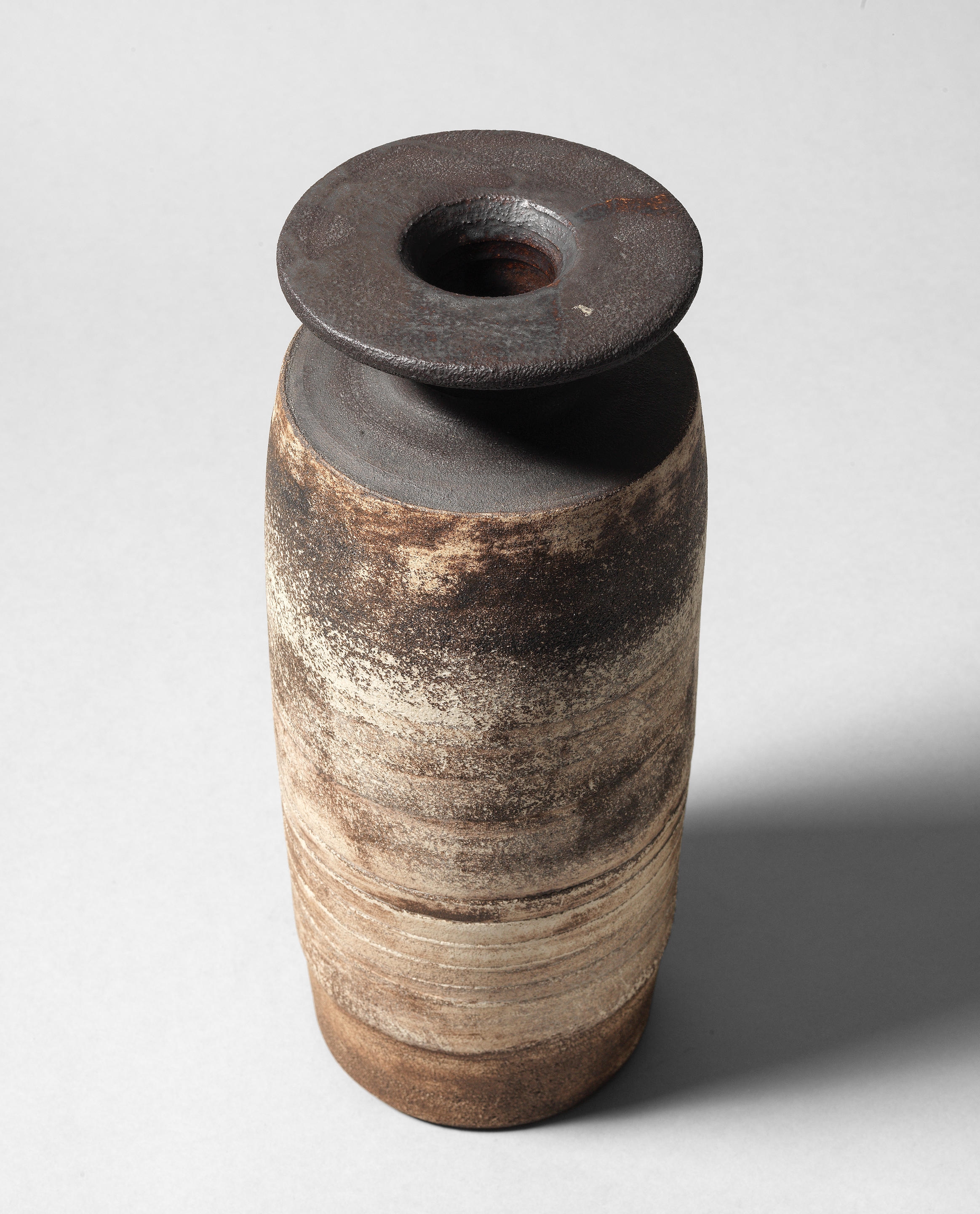 Hans Coper | Bottle vase with disc, (Circa 1957) | MutualArt