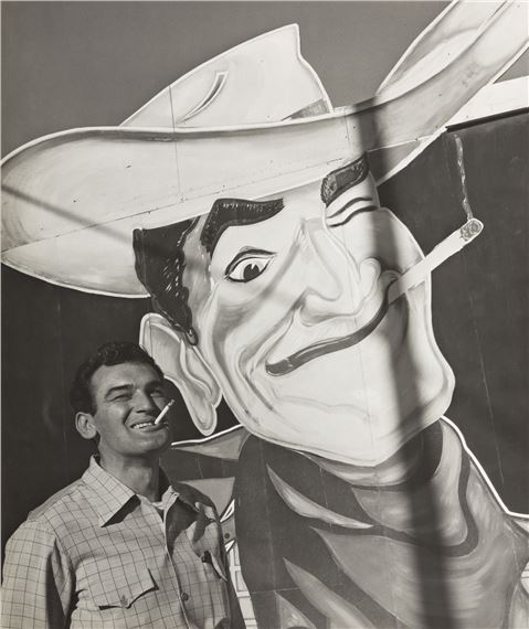 Peter Stackpole | Man with cigarette posing with a look-alike mural ...