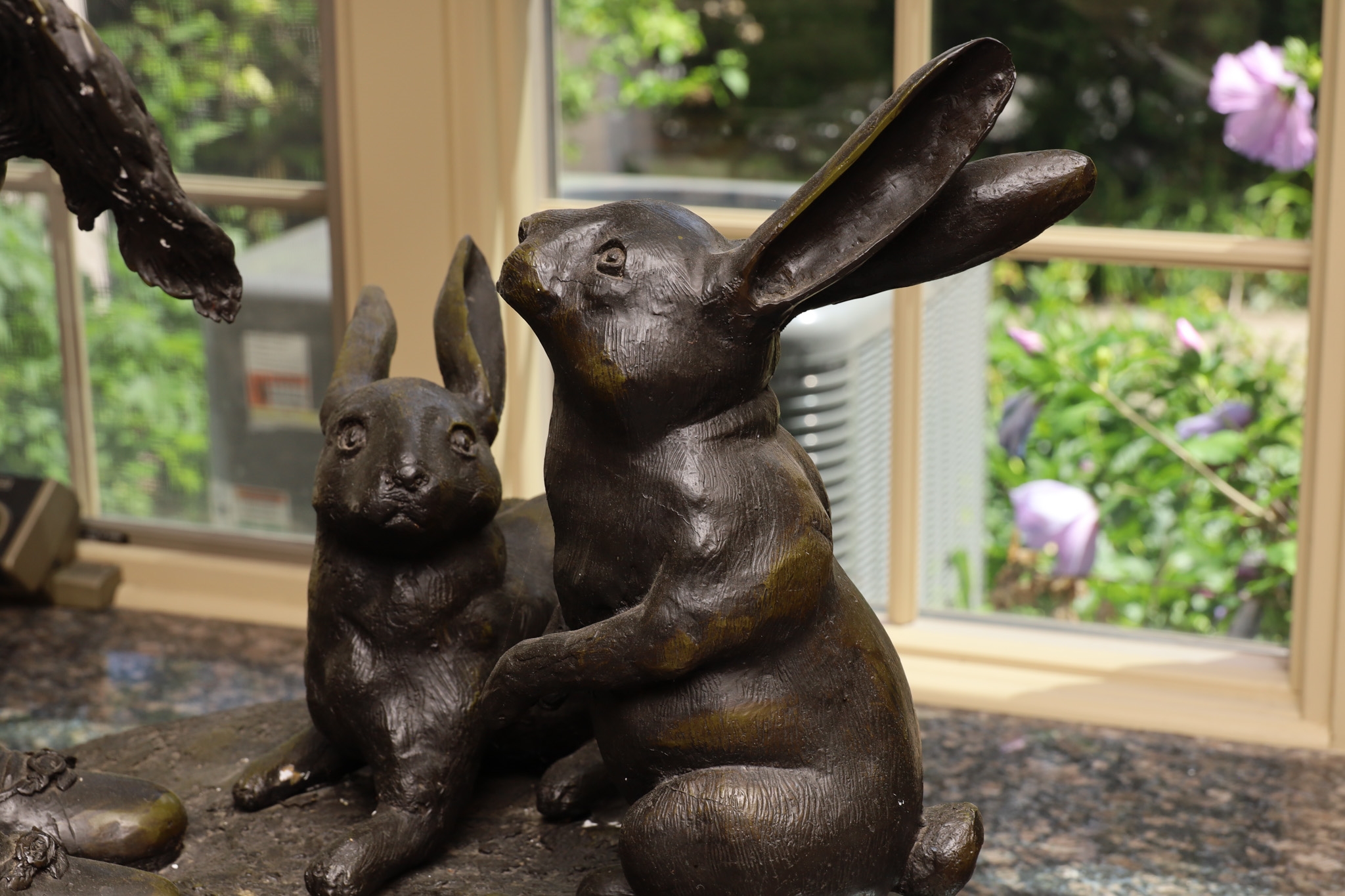 Jim Davidson | A Young Girl Feeding Two Rabbits | MutualArt