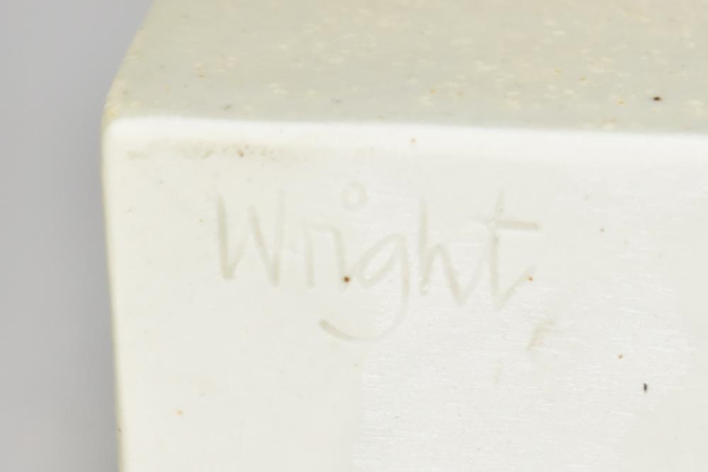 Peter Wright | two interlocking porcelain seated figures covered in ...