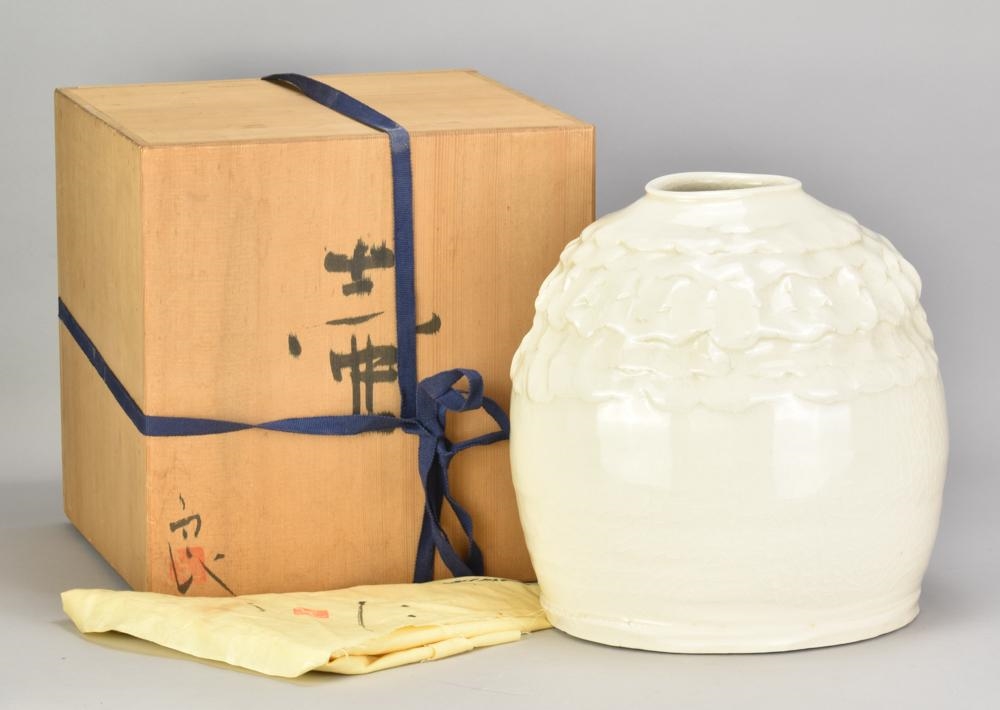 Ryoji Koie | a stoneware tsubo covered in white glaze with impressed ...