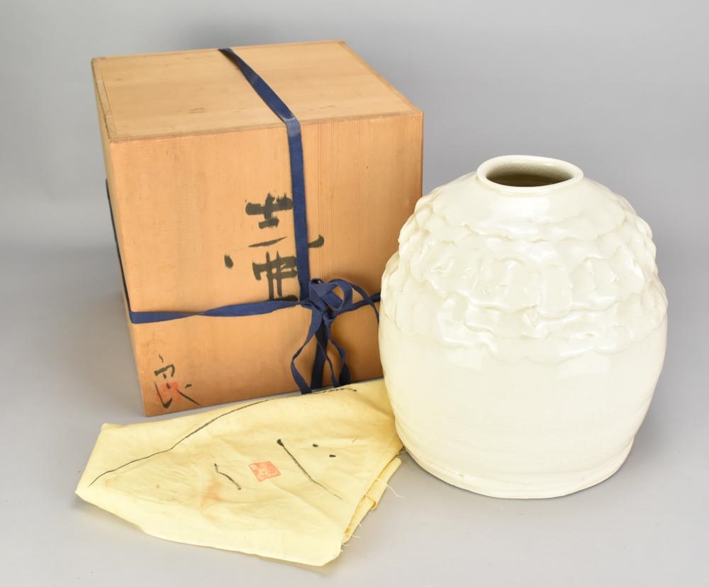 Ryoji Koie | a stoneware tsubo covered in white glaze with impressed ...